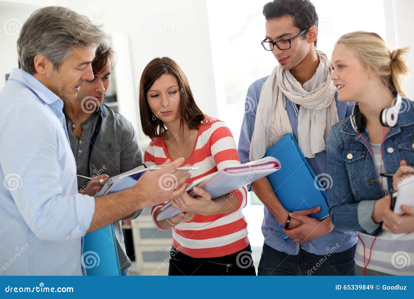 Students at School Talking To Professor Stock Image - Image of asking ...