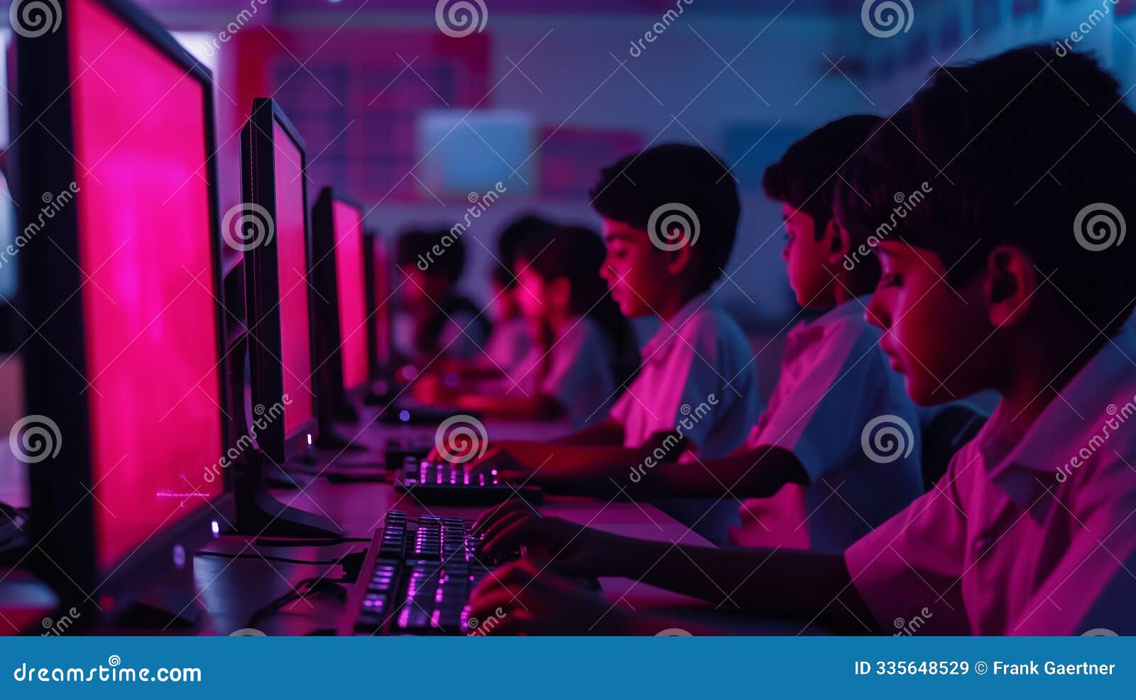 Students in School Uniforms Working on Desktop Computers in a Classroom ...