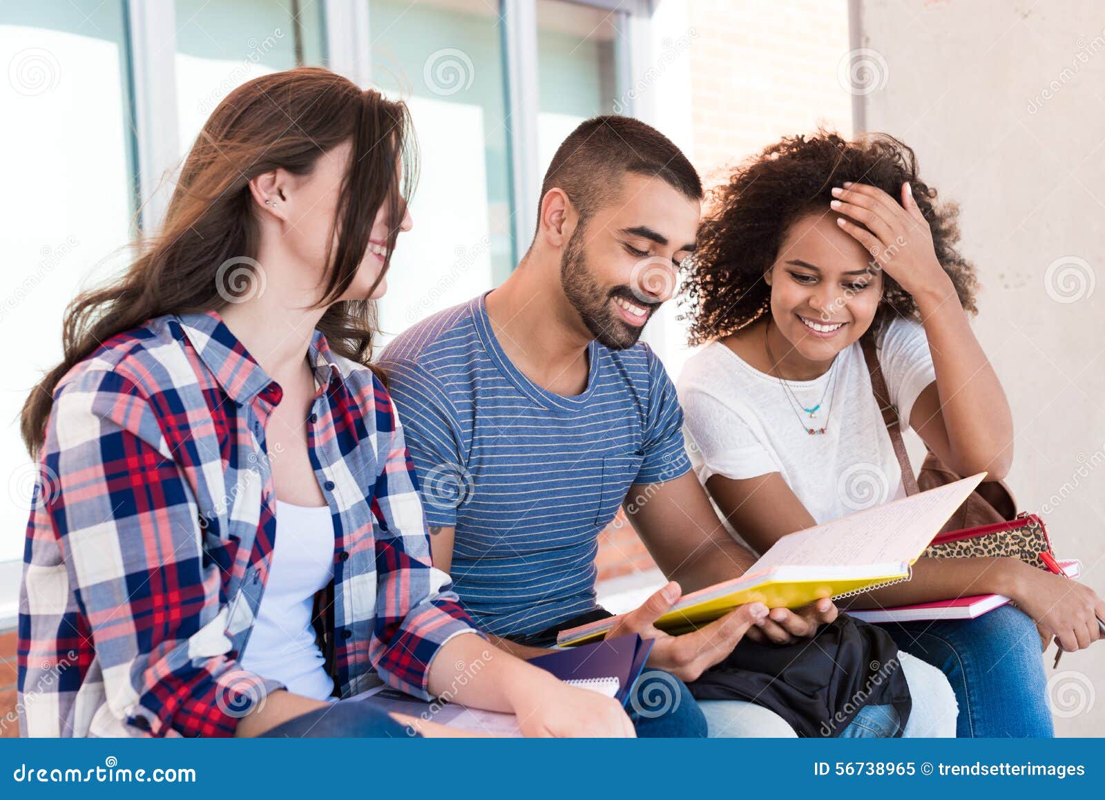 Students sharing notes stock image. Image of racism, hispanic - 56738965