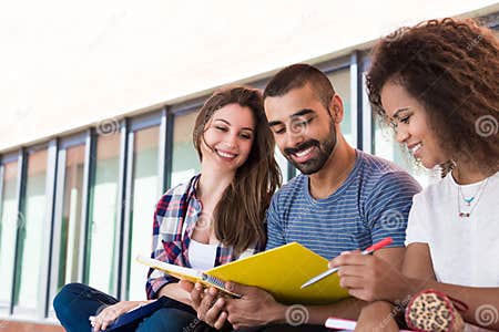 Students sharing notes stock image. Image of grade, people - 56739049