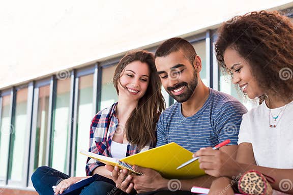 Students sharing notes stock image. Image of grade, people - 56739049