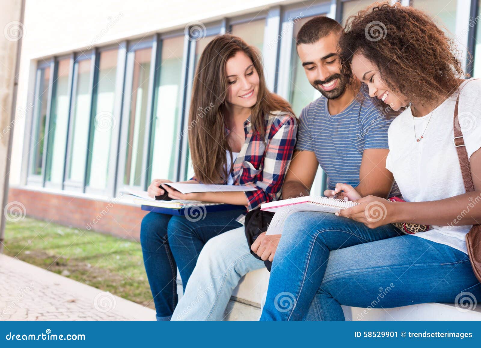 Students sharing notes stock image. Image of ethnic, group - 58529901