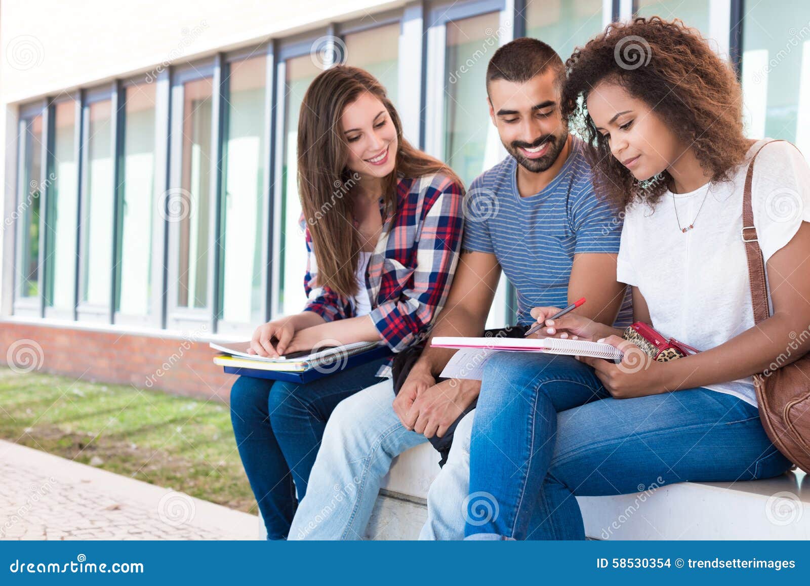 Students sharing notes stock photo. Image of hispanic - 58530354