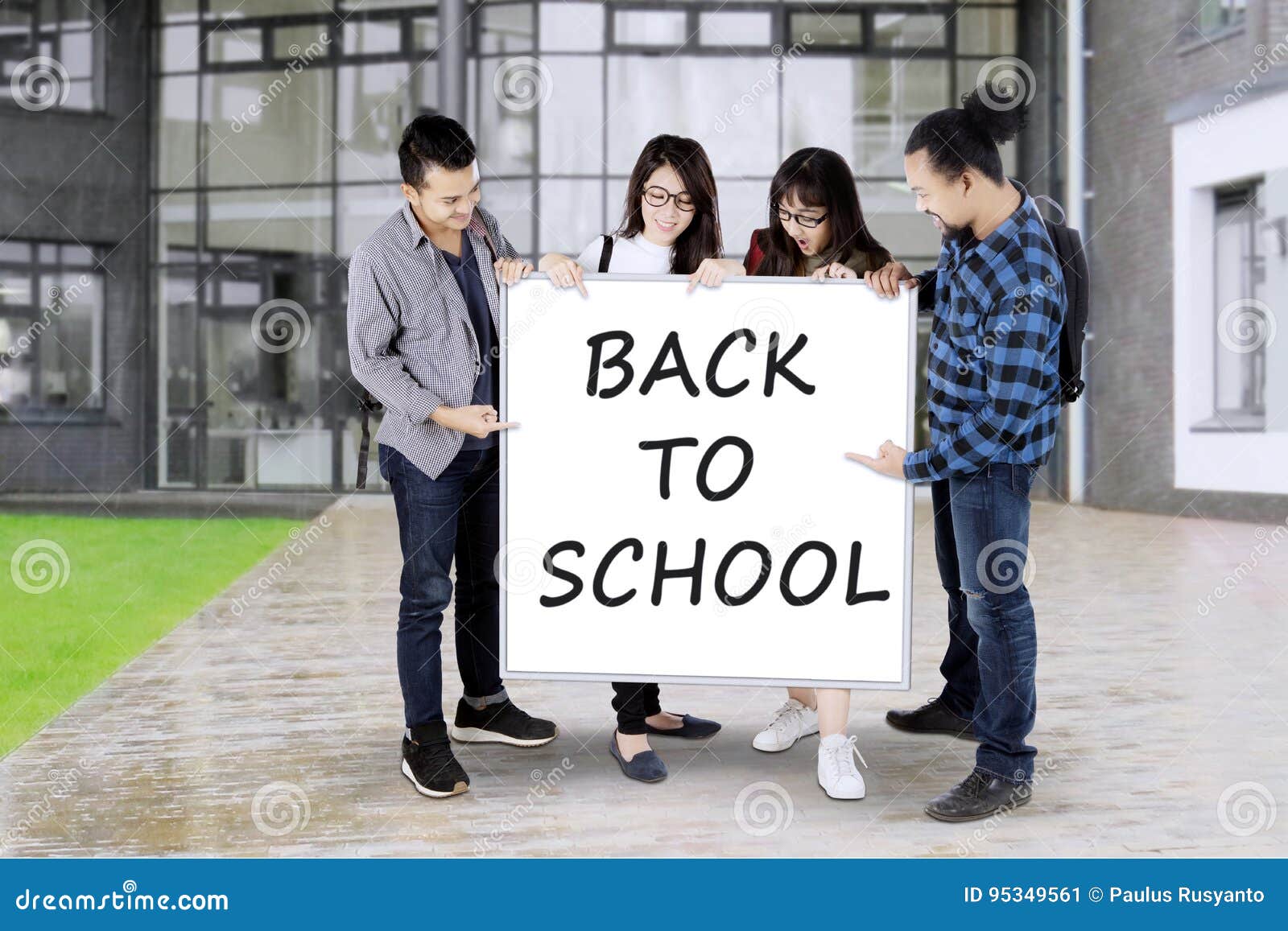 Students Showing Back To School Text at School Stock Image - Image of ...