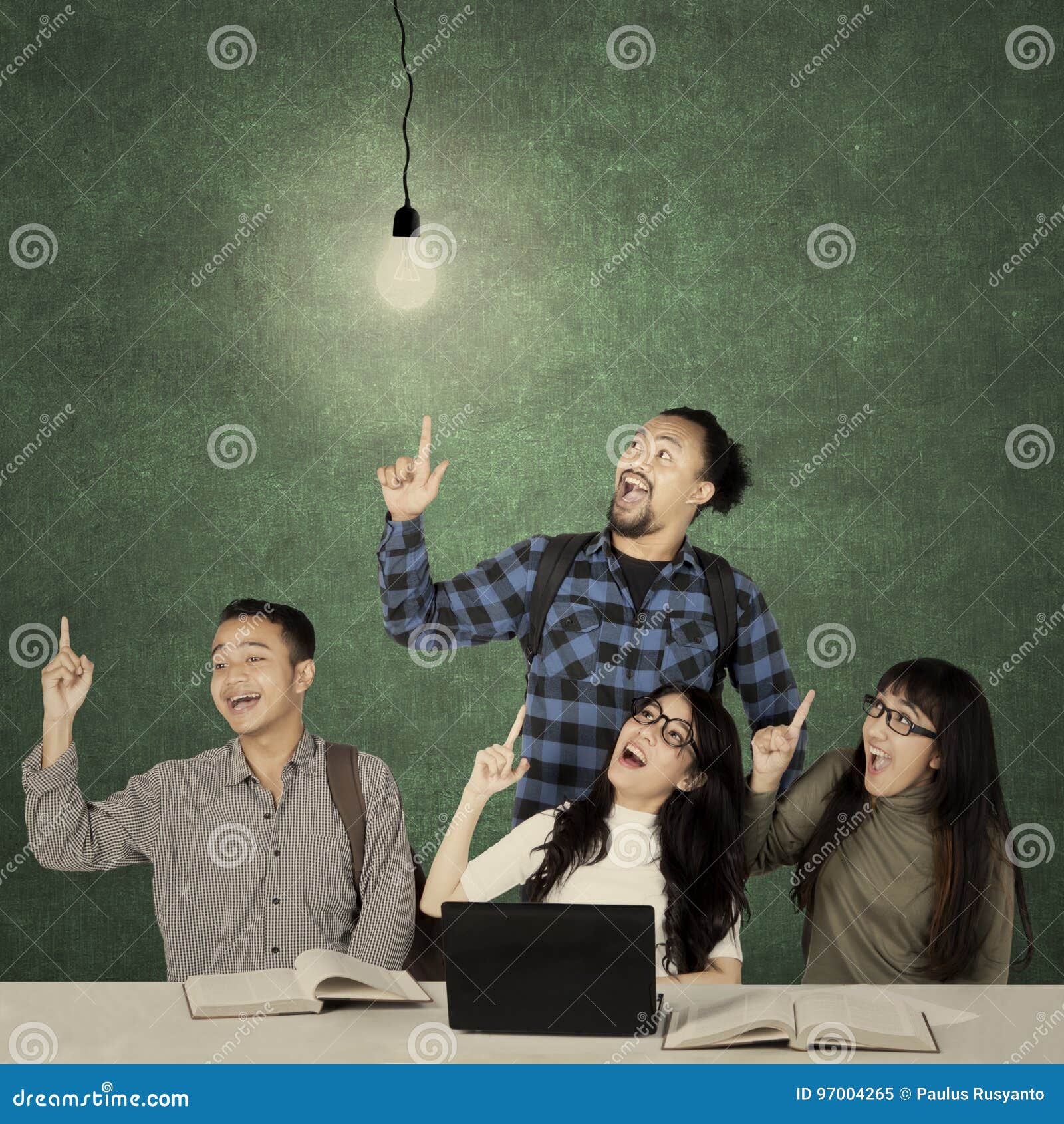 Students Sit Under Bright Light Bulb Stock Image - Image of bulb, idea ...