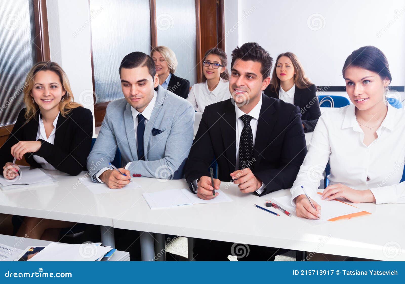 Students Sitting in the Audience and Listening Stock Image - Image of ...