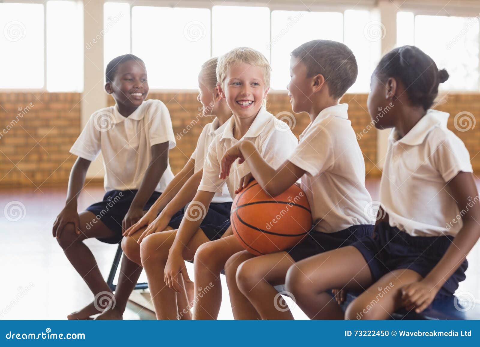 Students Sitting on Bench Talking with Each Other Stock Photo - Image ...