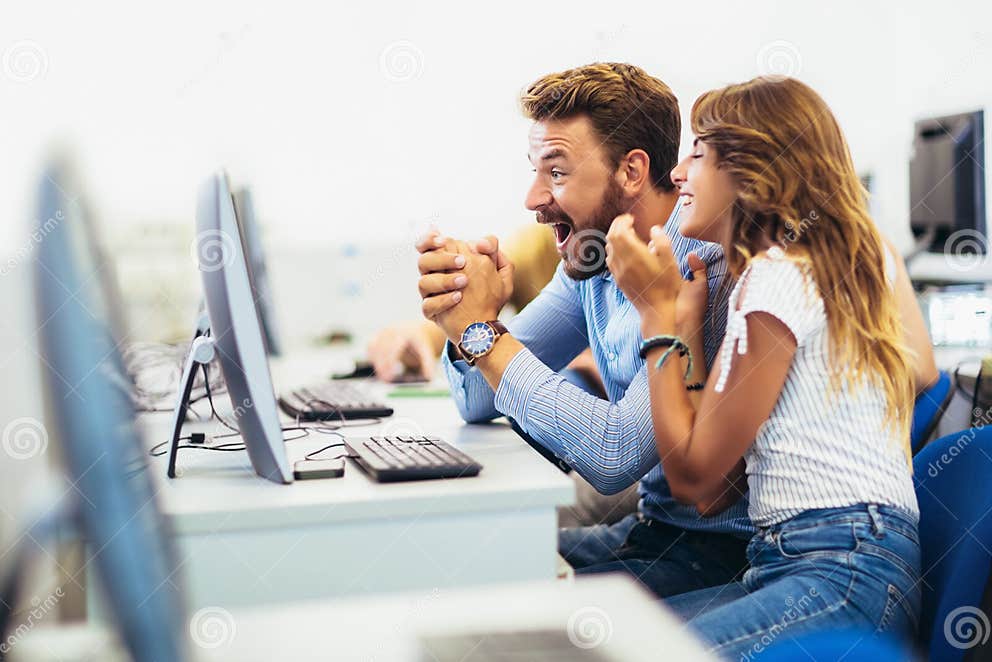 Students Sitting in a Classroom, Using Computers during Class Stock ...