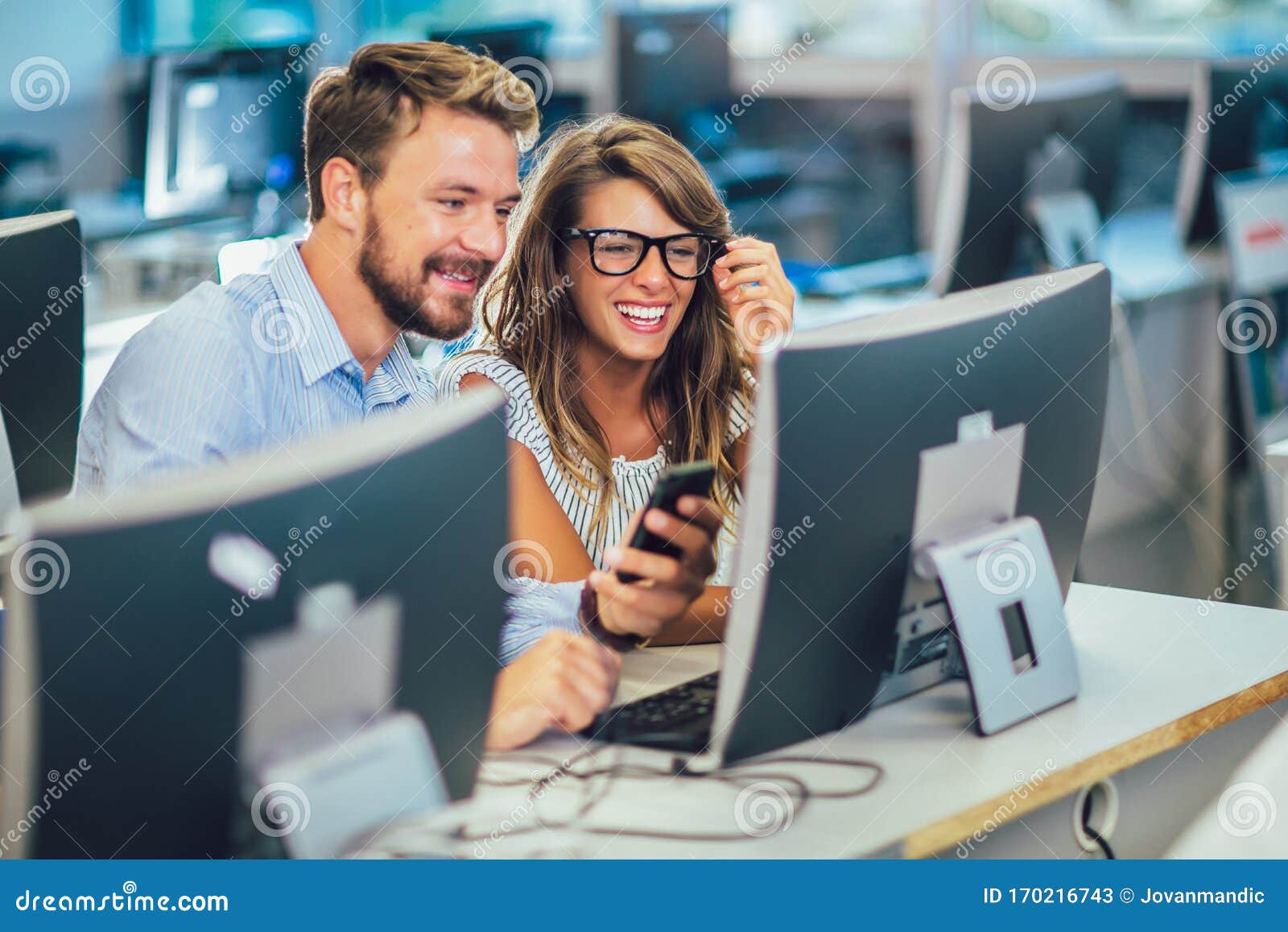 Students Sitting in a Classroom, Using Computers during Class Stock ...