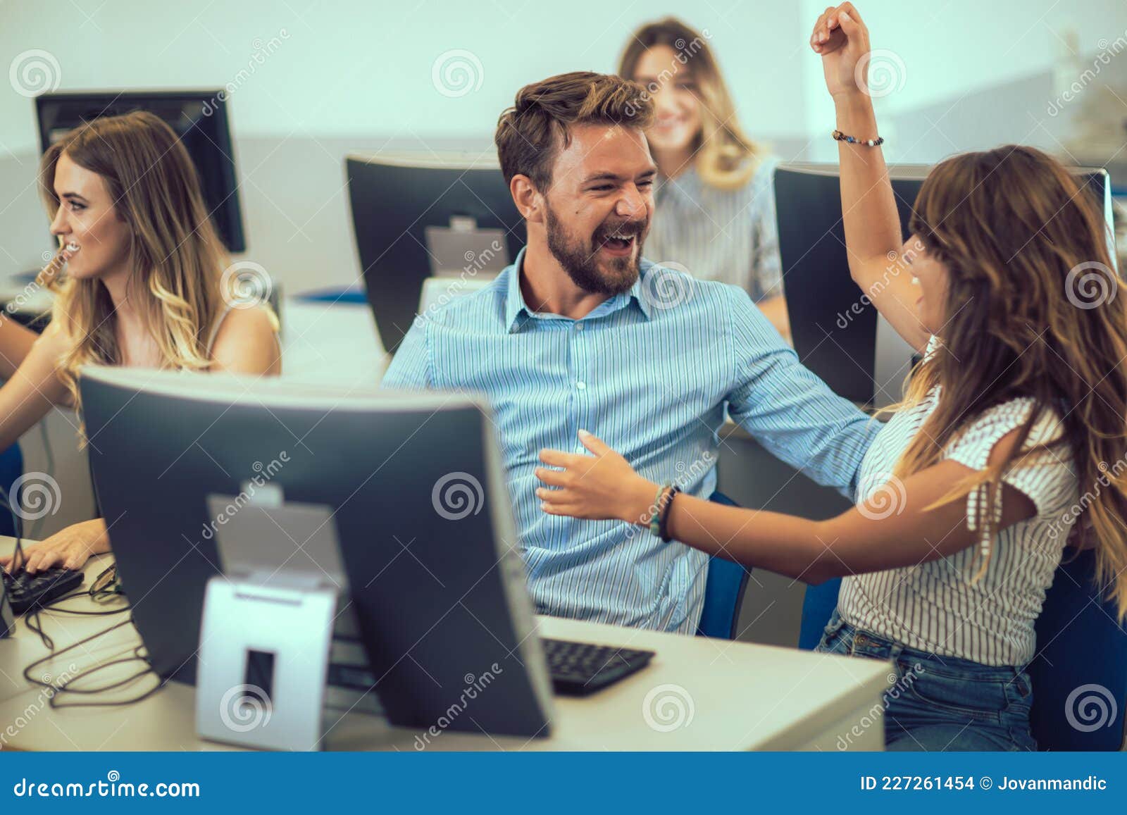 Students Sitting in a Classroom, Using Computers during Class Stock ...