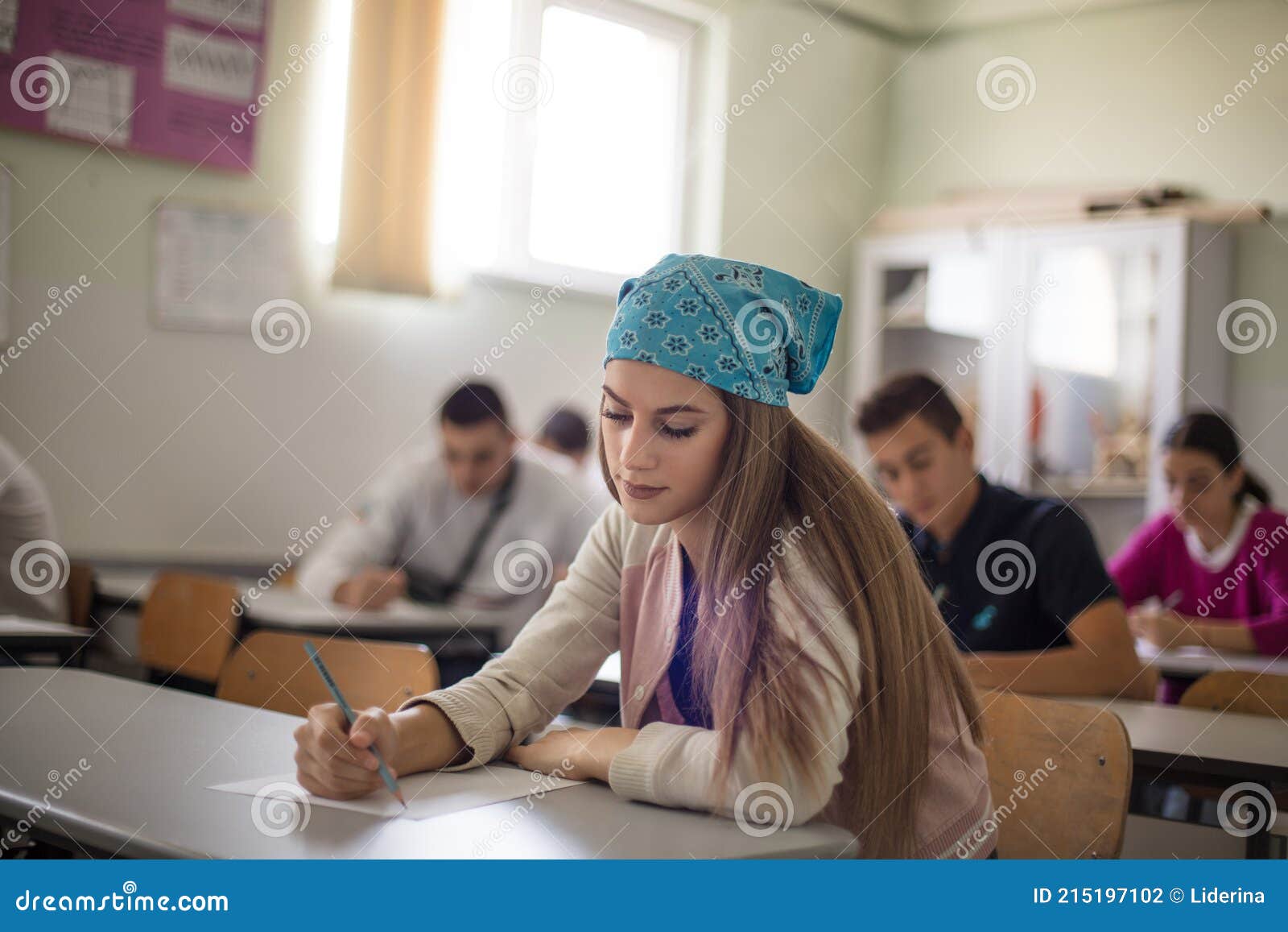 Students Sitting in the Classroom Working Exam Stock Photo - Image of ...