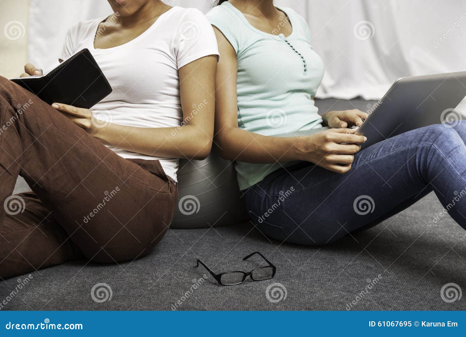 Students Sitting on the Floor Doing Their Homework Stock Image - Image ...