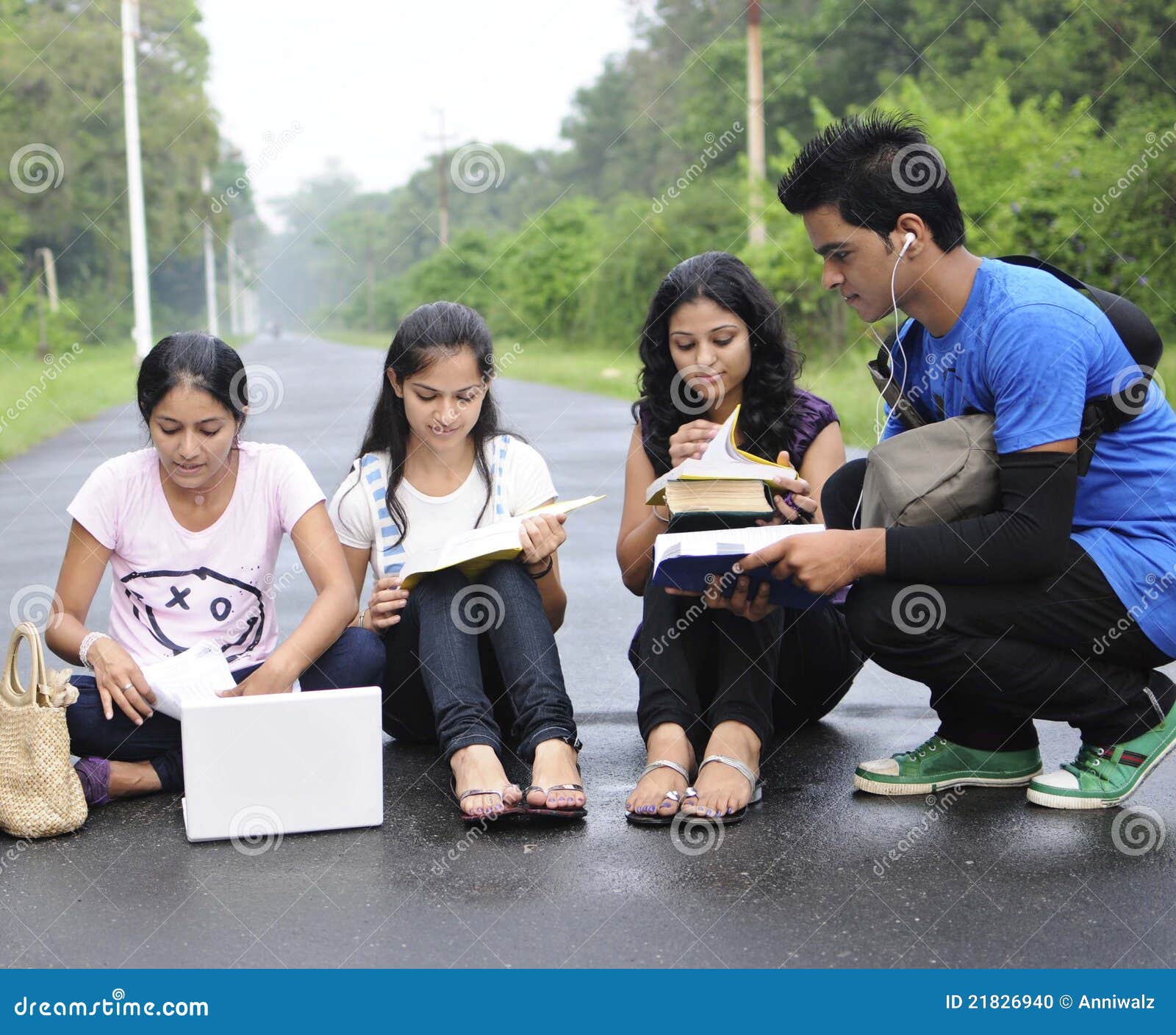 Students Sitting on the Road and Sharing Notes. Stock Photo - Image of ...