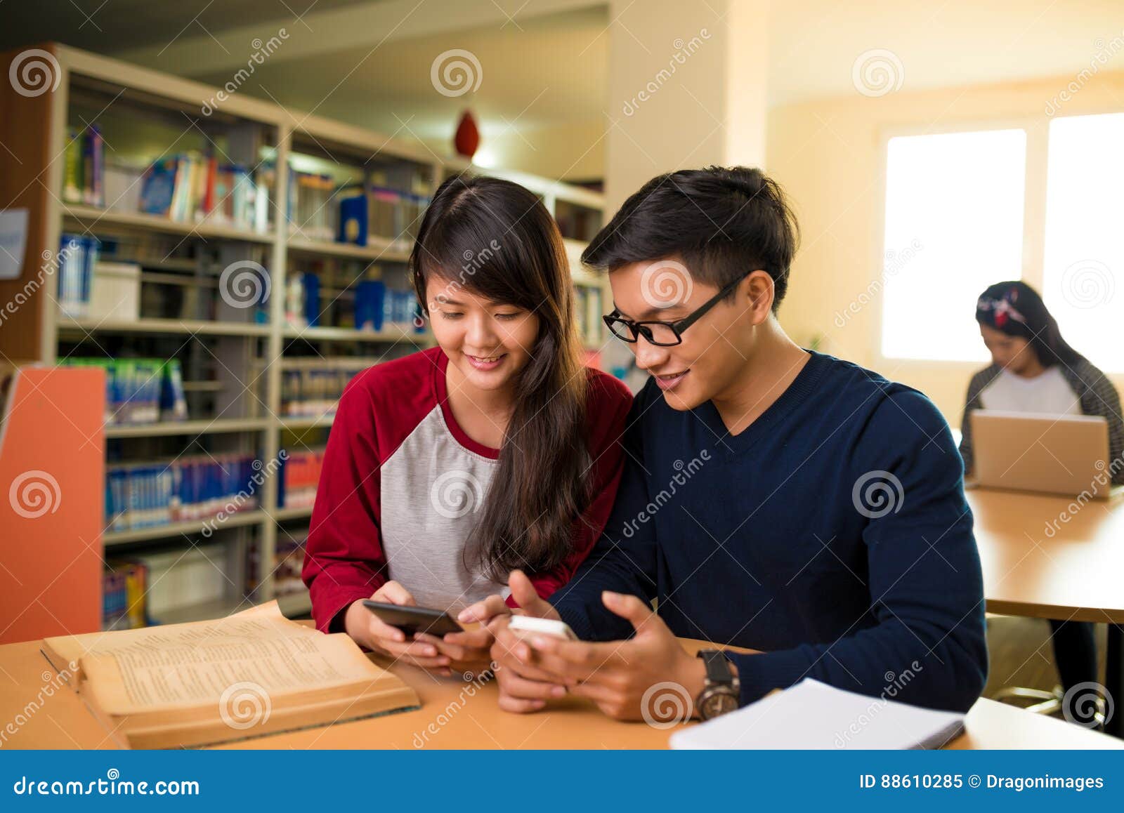 Students with smartphones stock image. Image of homework - 88610285