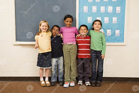 Students Standing in Classroom. Stock Image - Image of cheerful ...