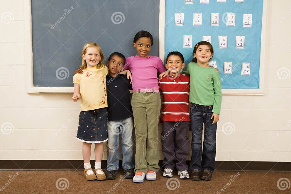 Students Standing in Classroom. Stock Image - Image of cheerful ...