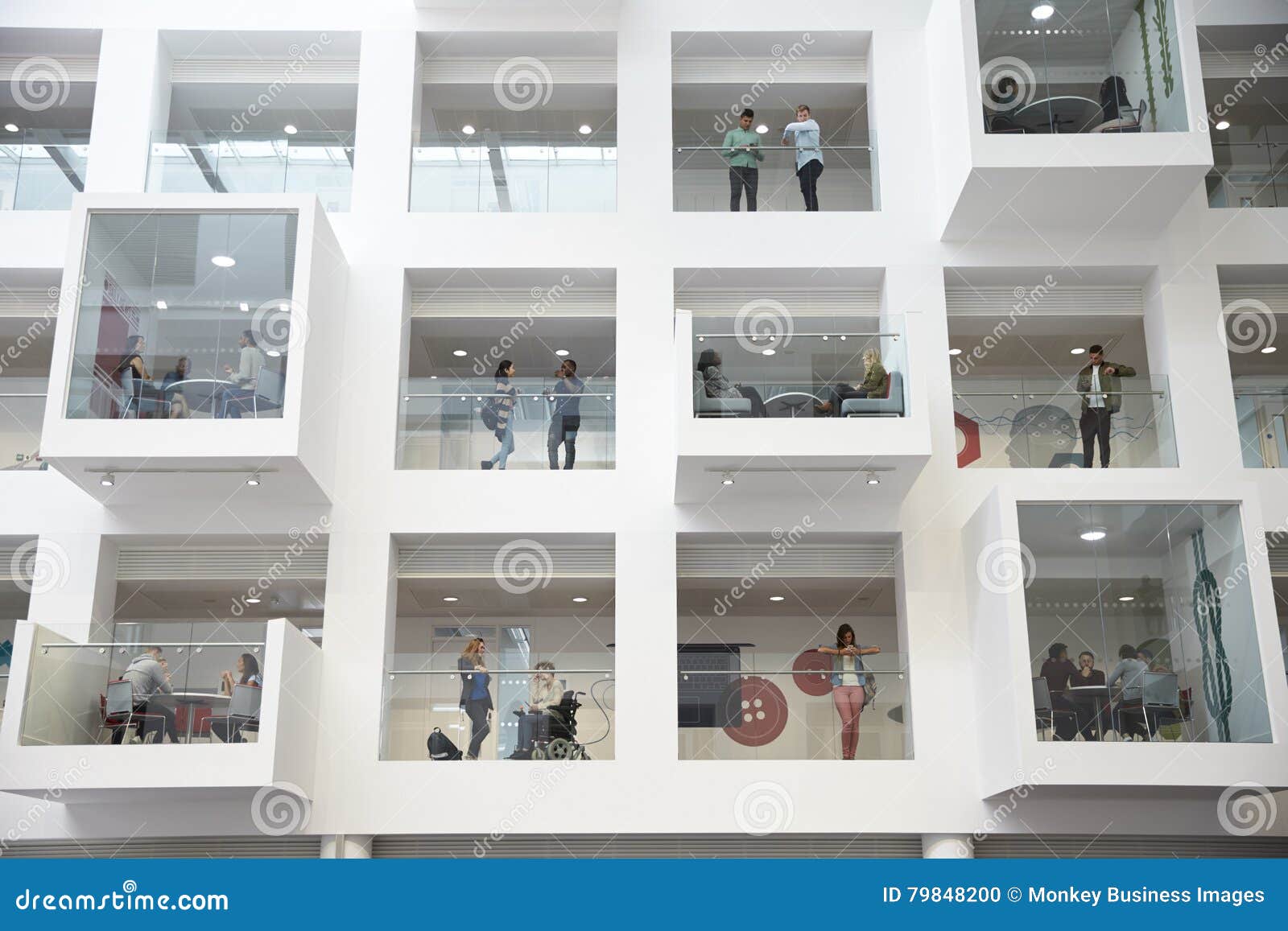 Students in Study Rooms, Visible from the University Lobby Stock Photo ...