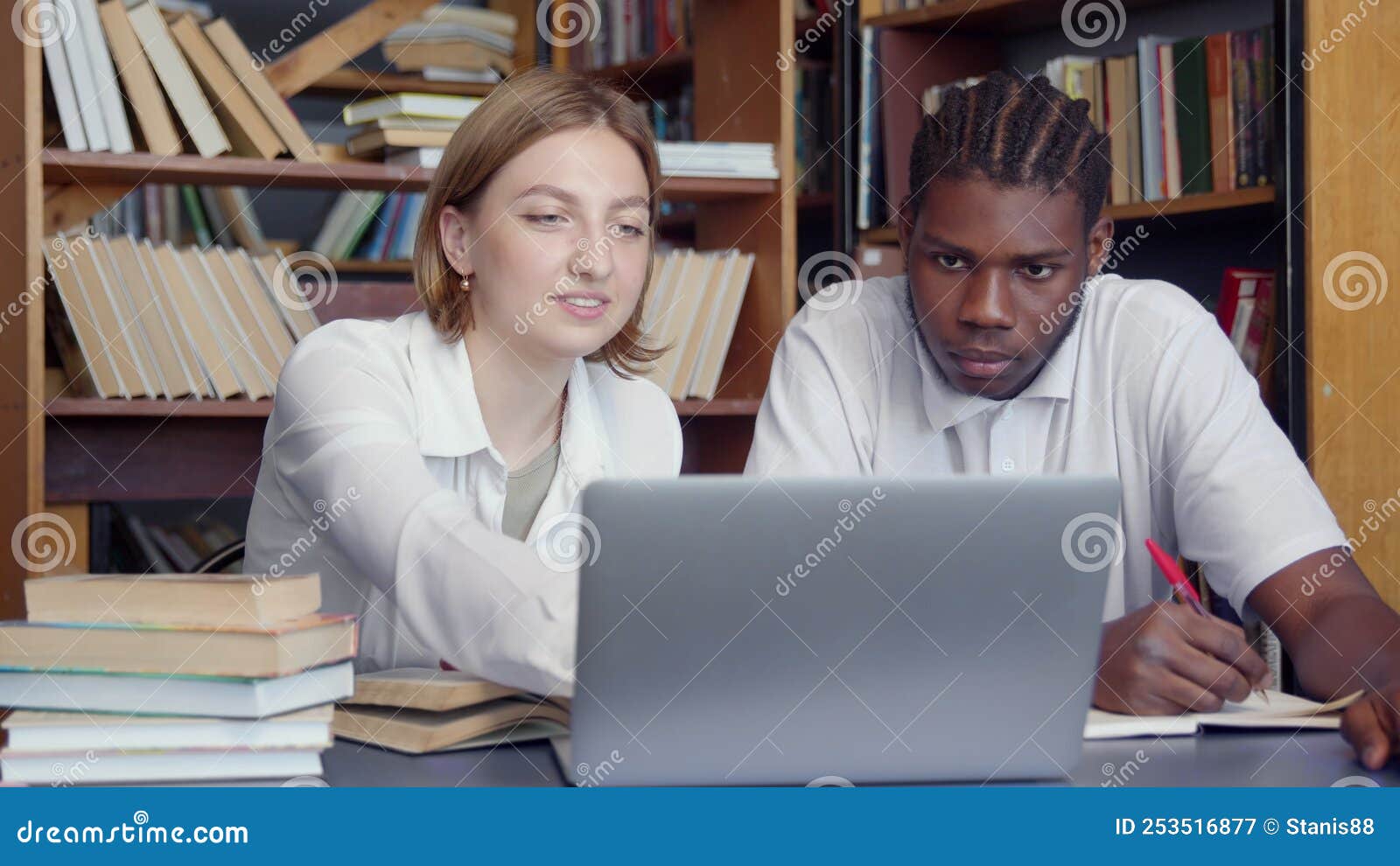 4K. Students Study Together in the Library. Students Prepare for Exams ...