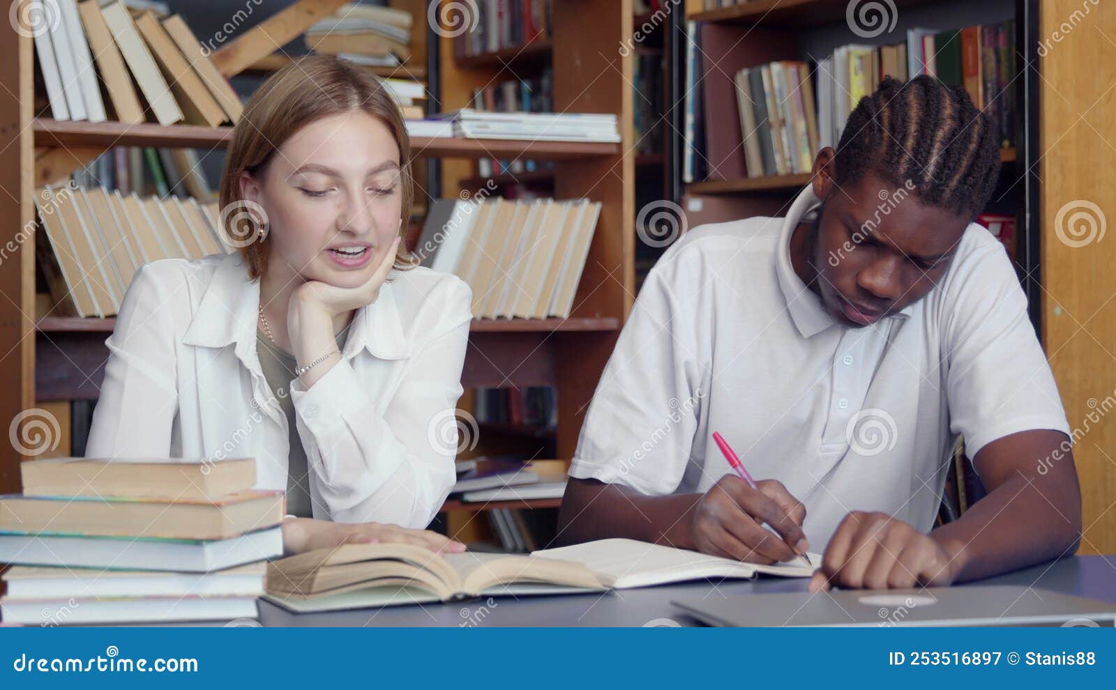 4K. Students Study Together in the Library. Students Prepare for Exams ...