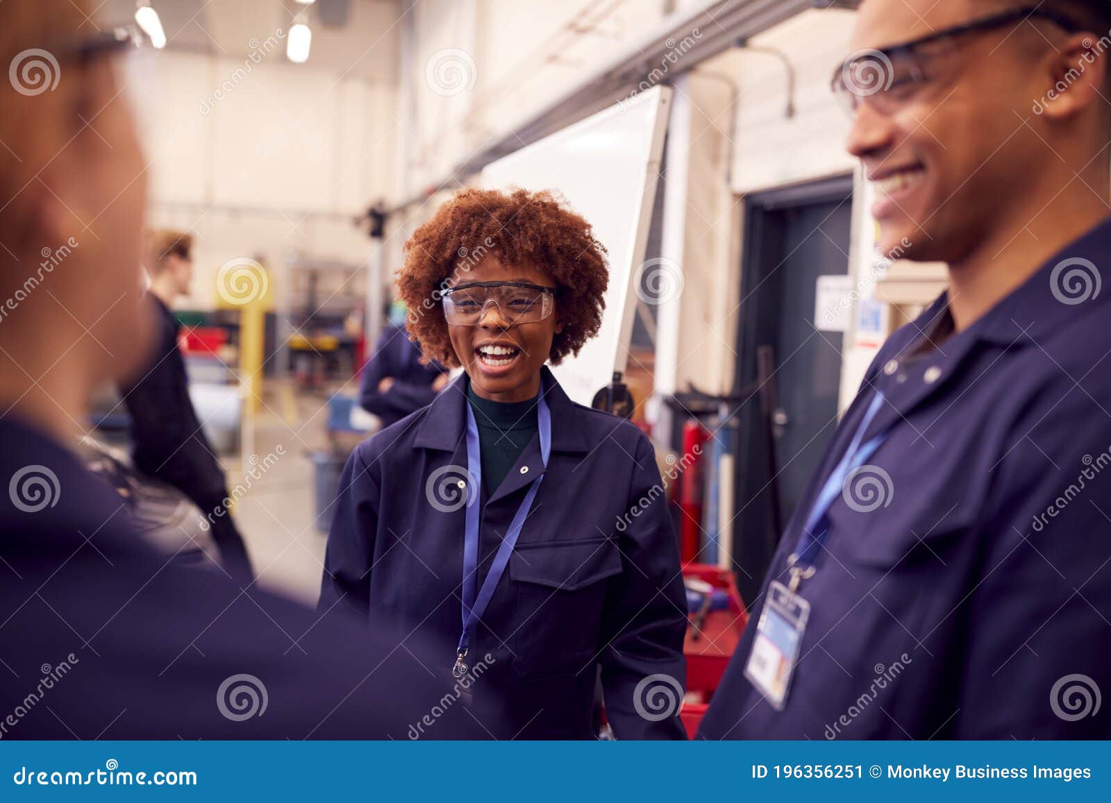 Students Studying for Auto Mechanic Apprenticeship at College Standing ...
