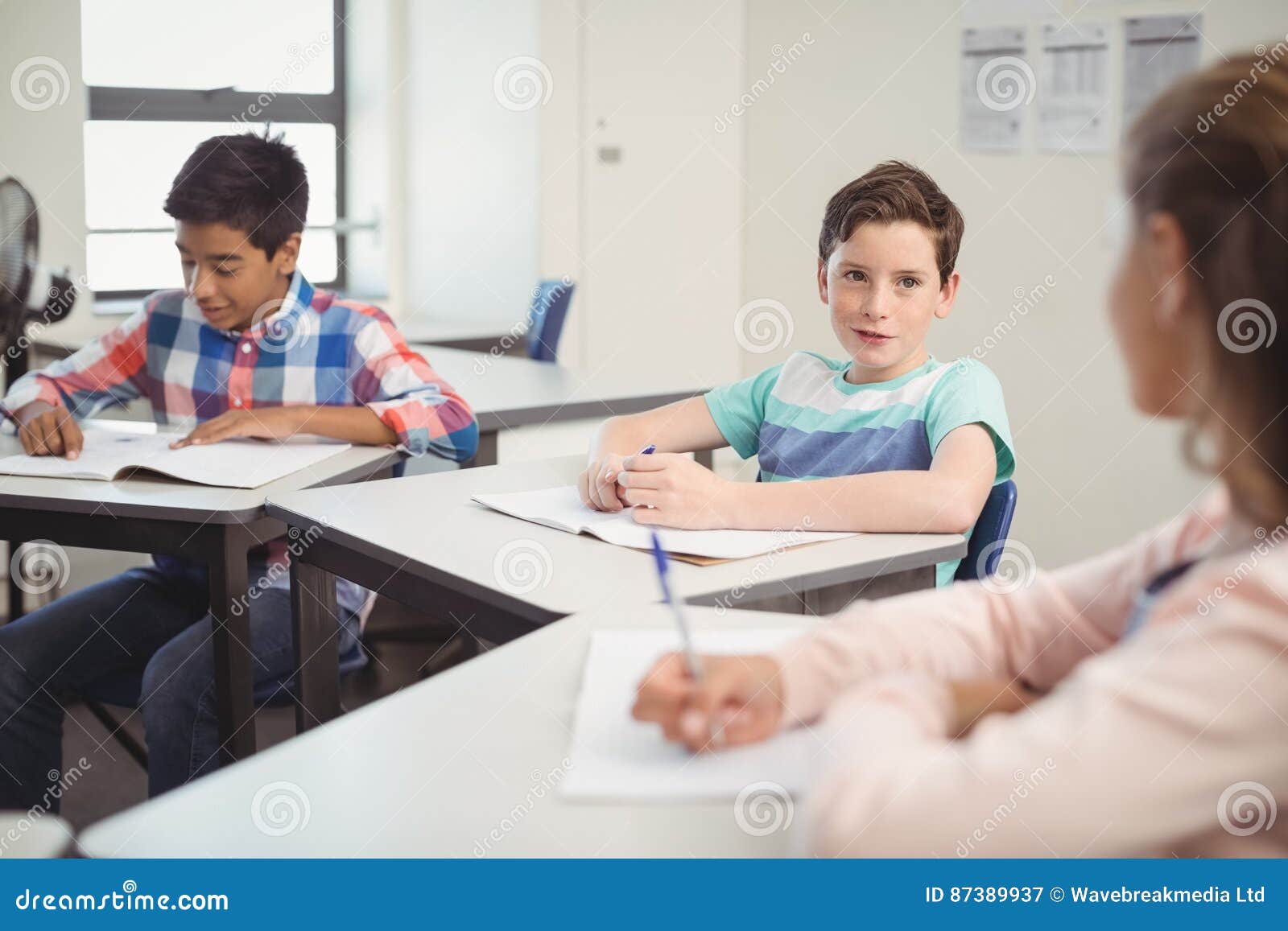 Students Studying in Classroom Stock Image - Image of modern, mixedrace ...