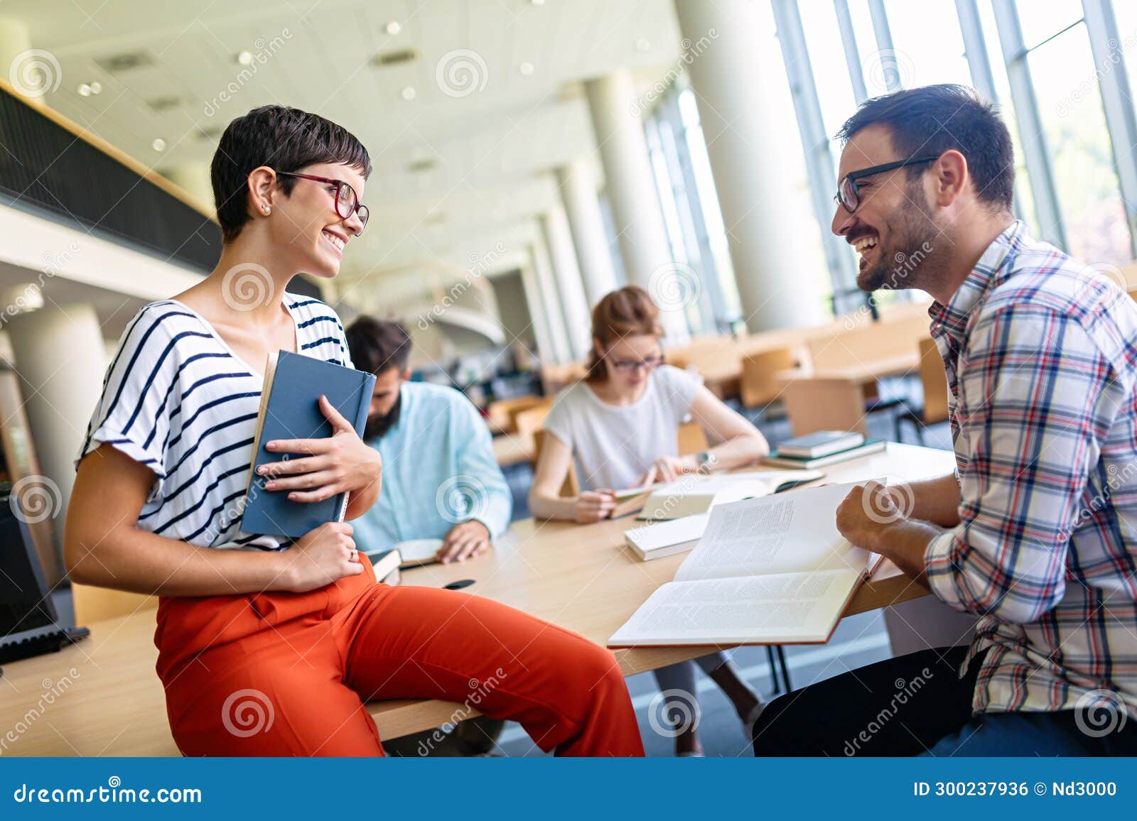 Students Studying in Library. Young Success People are Spending Time ...