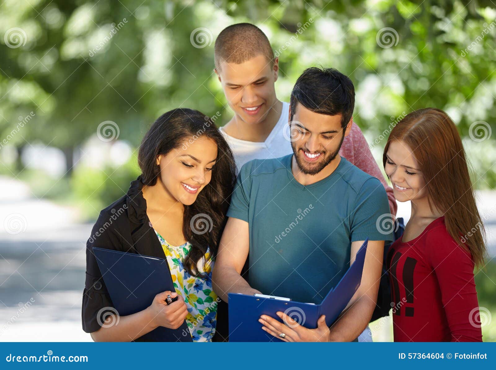 Students studying outside stock photo. Image of students - 57364604