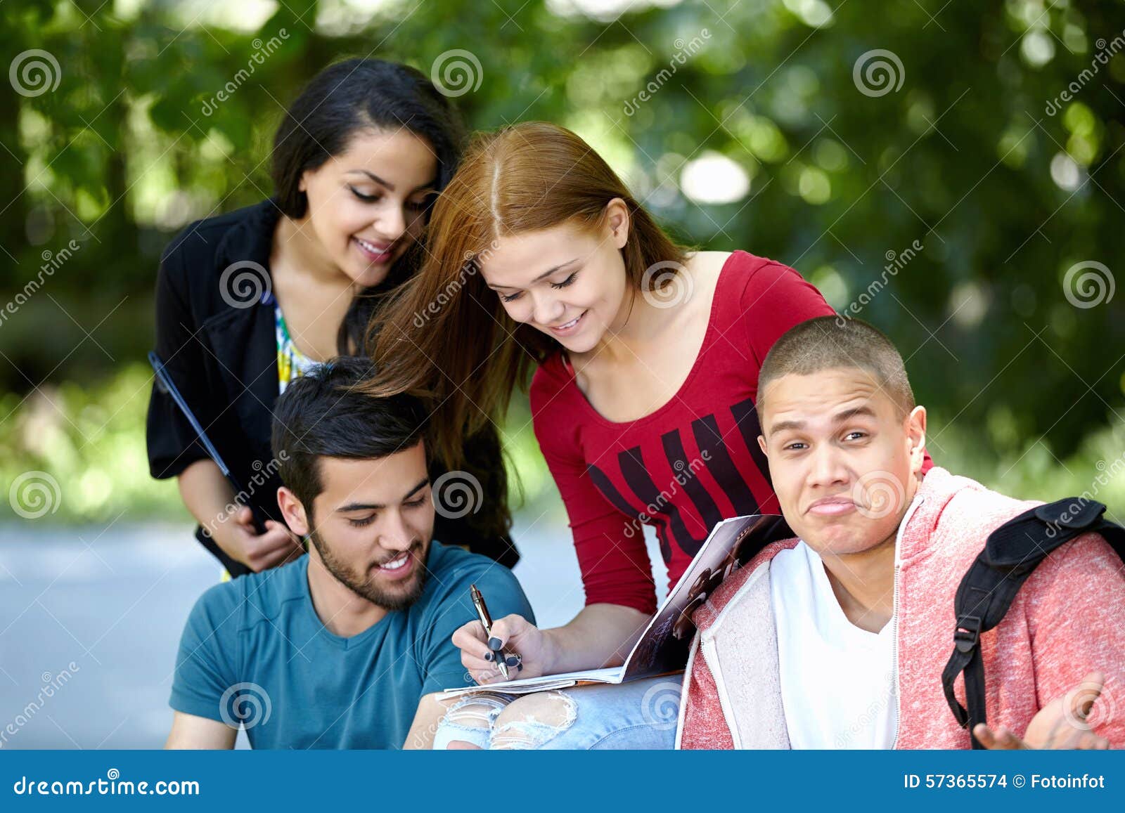 Students studying outside stock photo. Image of students - 57365574