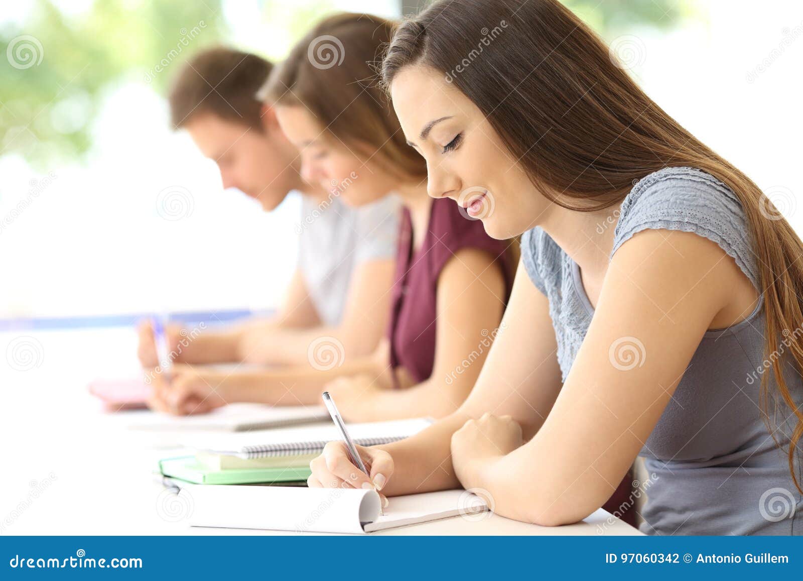 Students Studying Taking Notes at Classroom Stock Photo - Image of ...