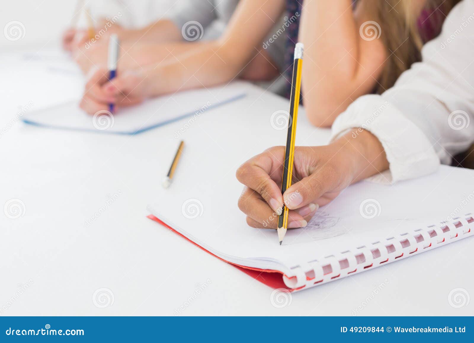 Students Taking Notes in Class Stock Photo - Image of school, adult ...