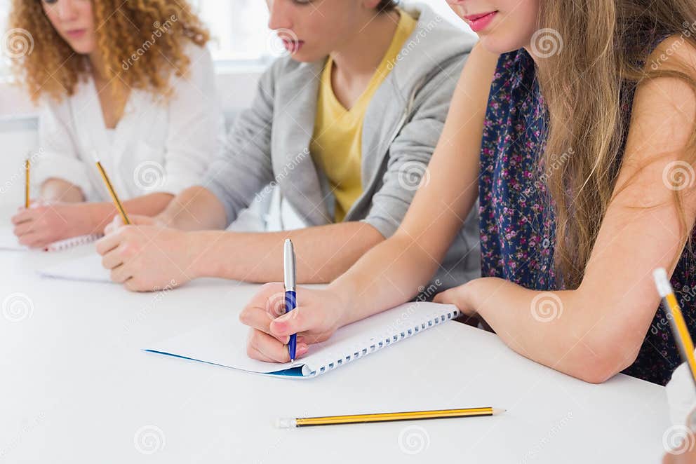 Students Taking Notes in Class Stock Photo - Image of girl, adult: 49210374
