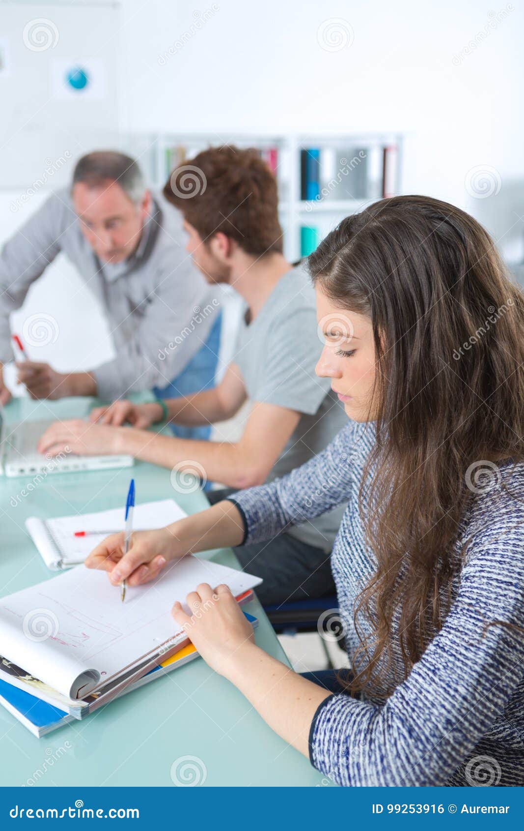 Students Taking Notes while Teacher Talking Stock Photo - Image of ...