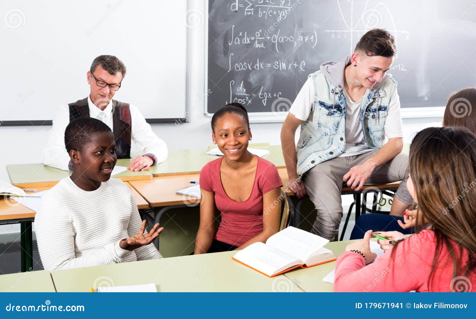 Students Talking In Class While Teacher Is Talking