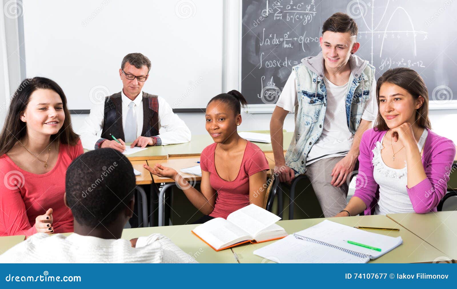 Students Talking In Class While Teacher Is Talking