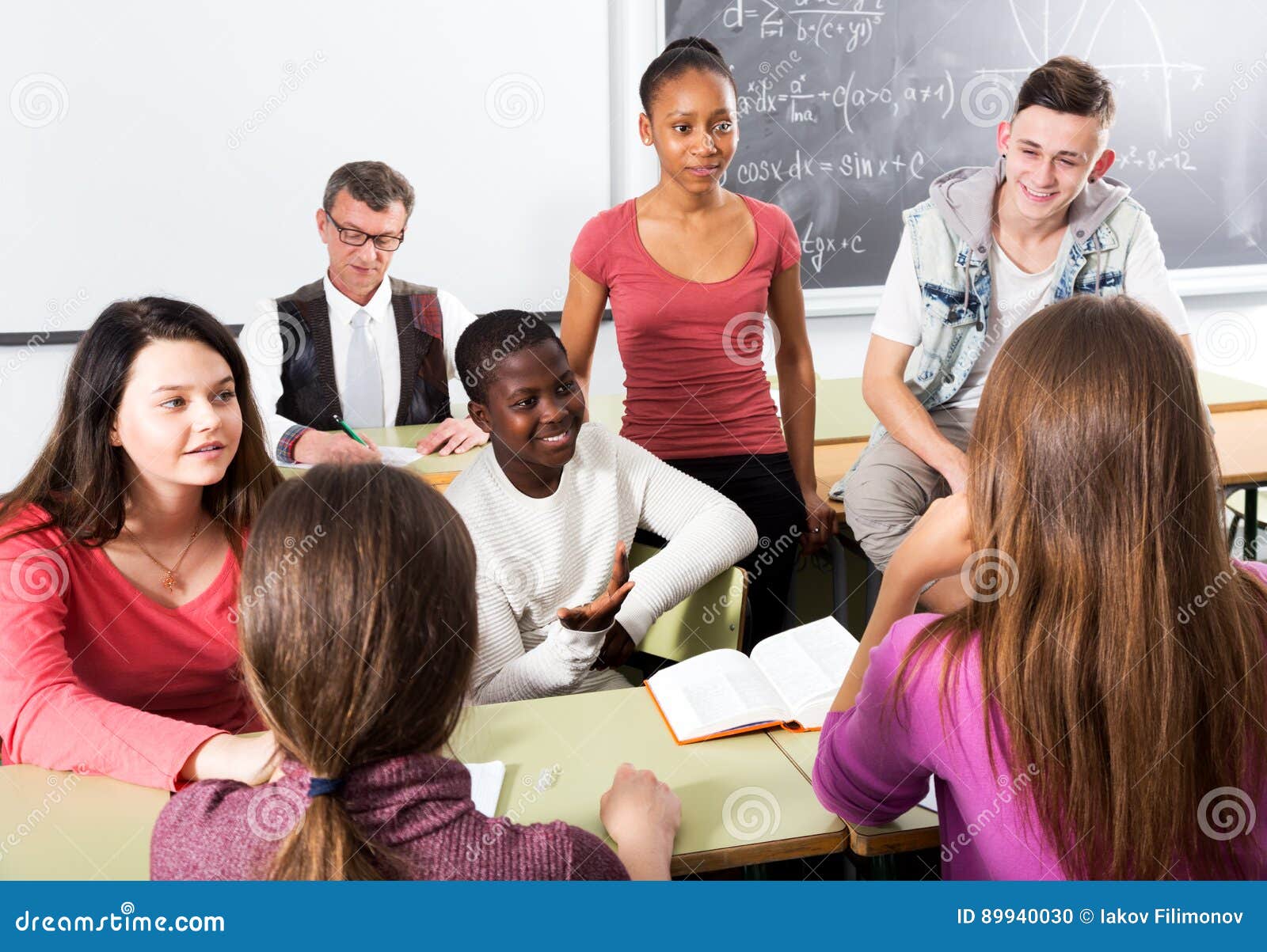 Students Talking In Class While Teacher Is Talking