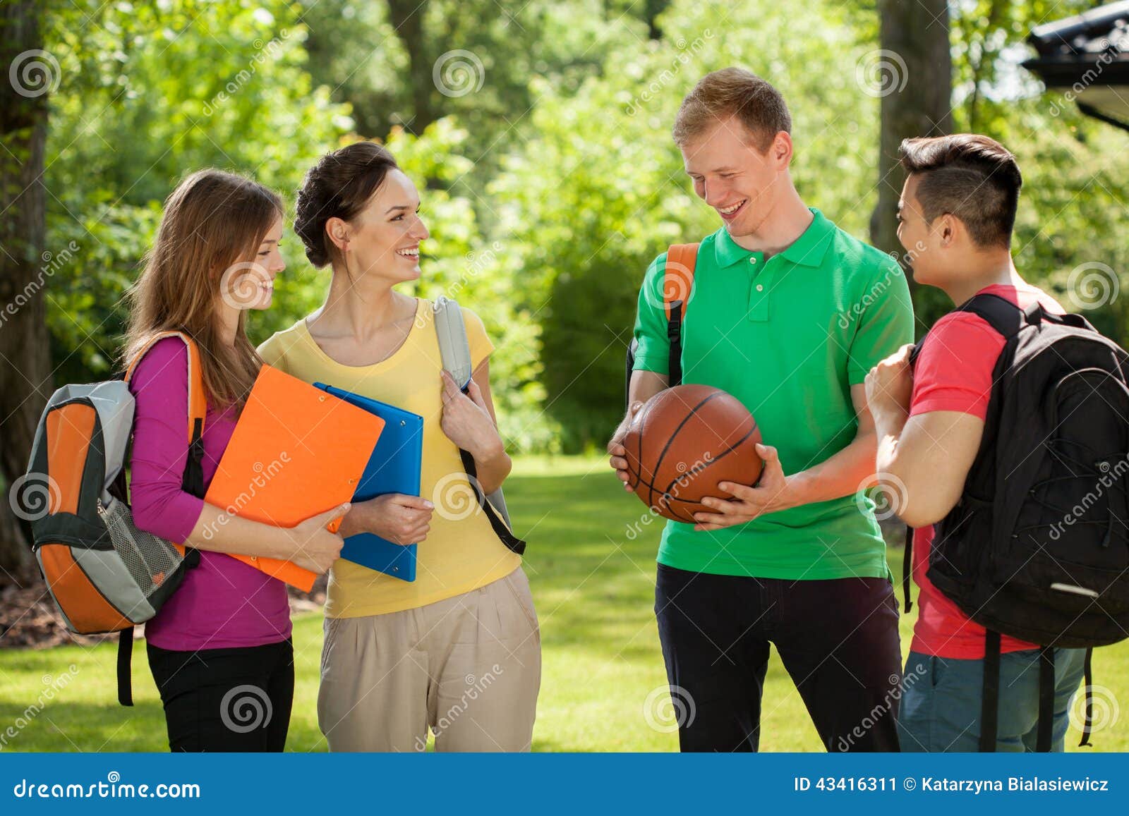 Students talking outdoors stock image. Image of cultural - 43416311