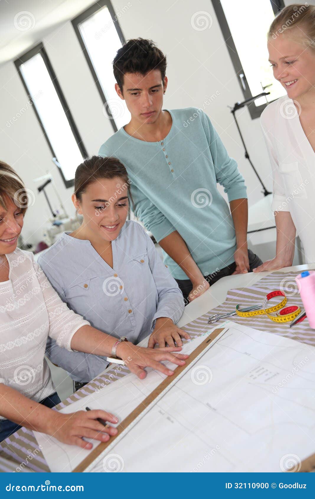 Students with Teacher in Dressmaking Class Stock Photo - Image of ...