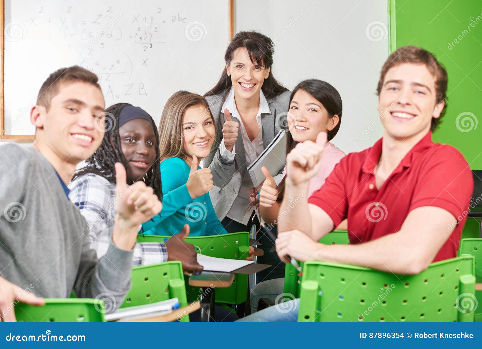 Students and Teacher Hold Their Thumbs Up Stock Photo - Image of study ...
