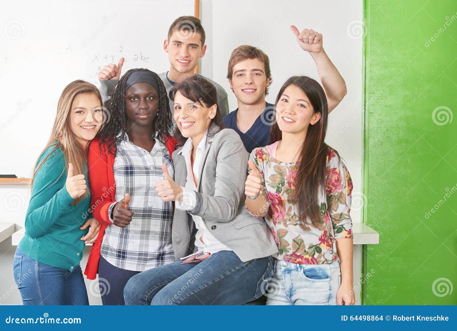 Students and Teacher Hold Their Thumbs Up Stock Photo - Image of school ...