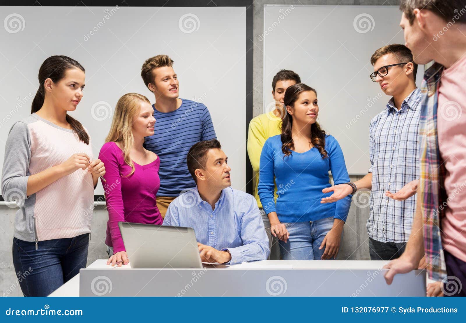 Students and Teacher with Laptop at School Stock Image - Image of ...