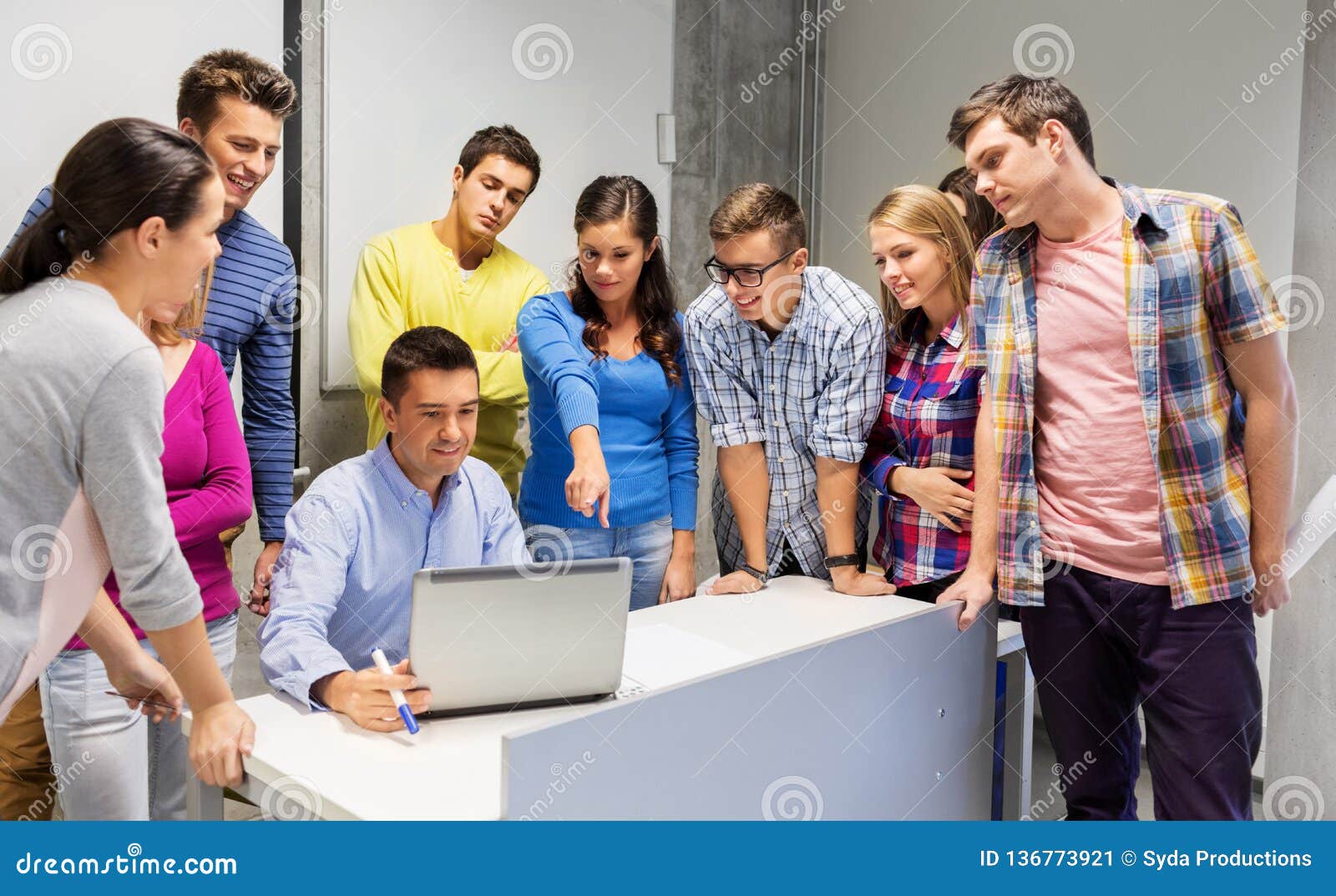 Students and Teacher with Laptop at School Stock Image - Image of ...