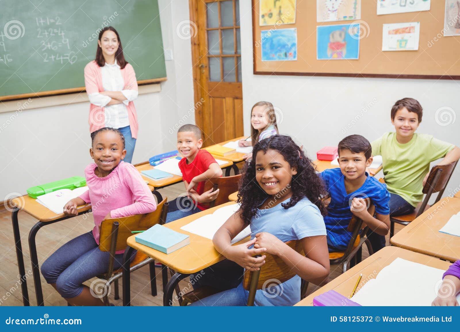 Students and Teacher Looking at the Camera Stock Photo - Image of early ...
