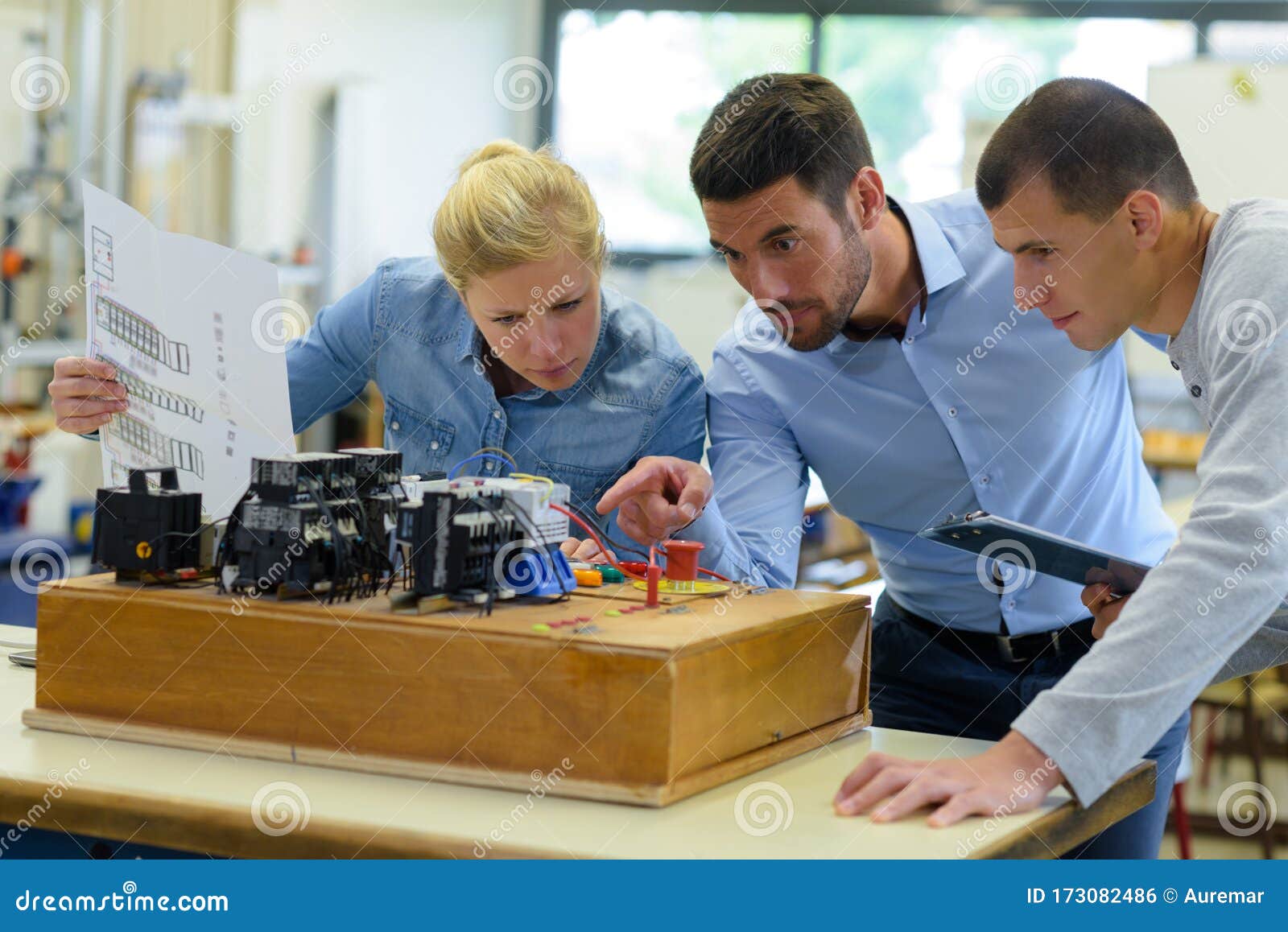 Students and Teacher Looking at Electronic Circuit Board Stock Photo ...