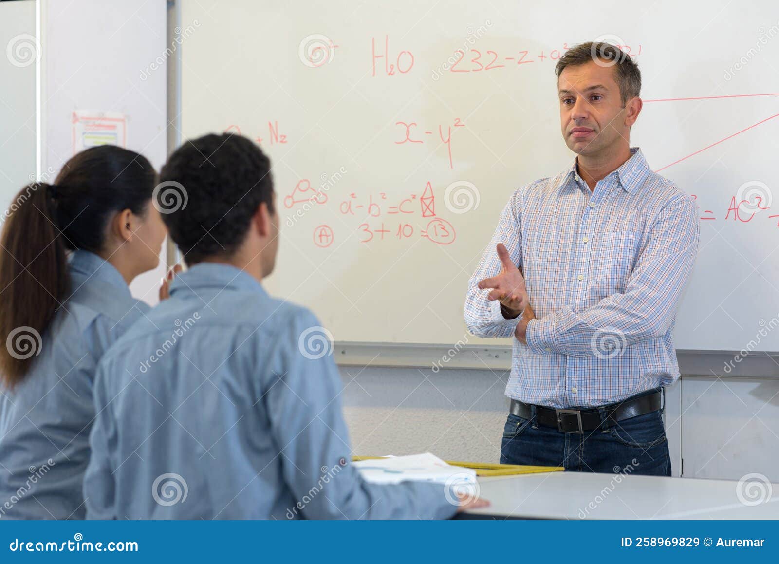 Students and Teacher with Math Formulas on White Board Stock Image ...