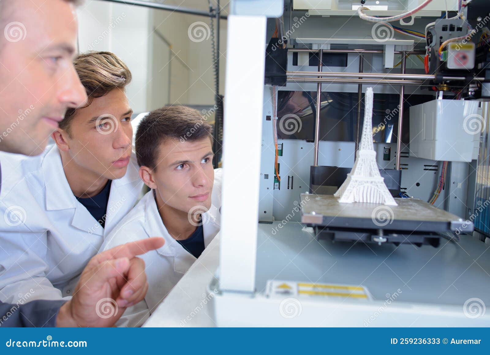Students and Teacher Watching Experiment with Model Eiffel Tower Stock Image - Image of positive ...