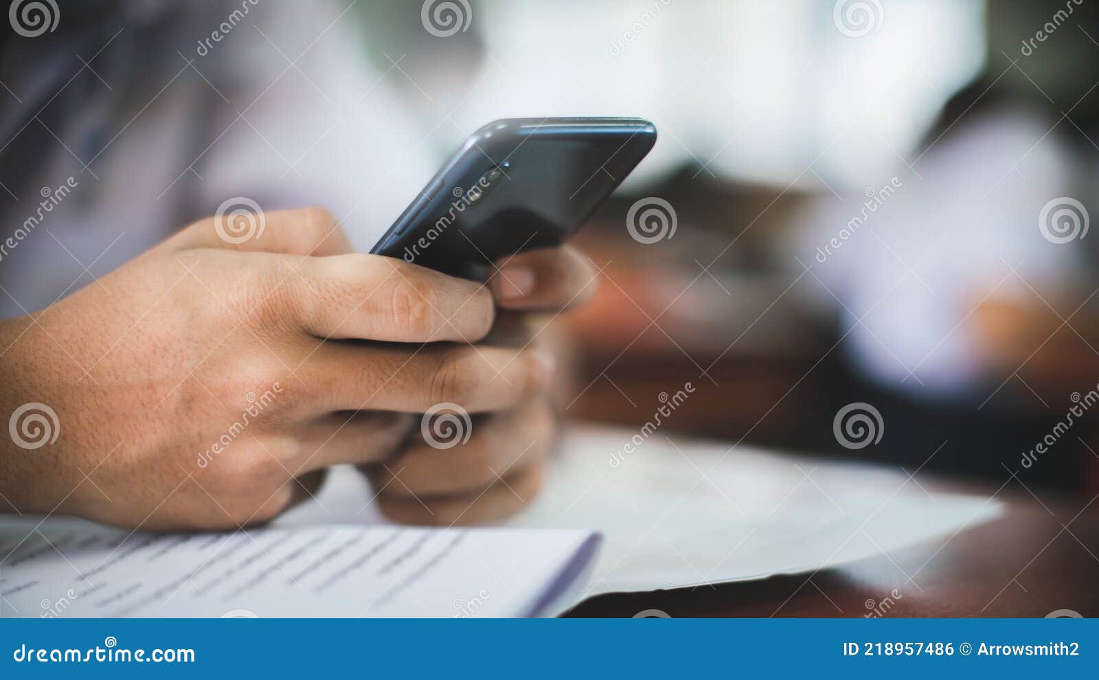 Students are Test Exam and Study Online by Using Smartphone in ...