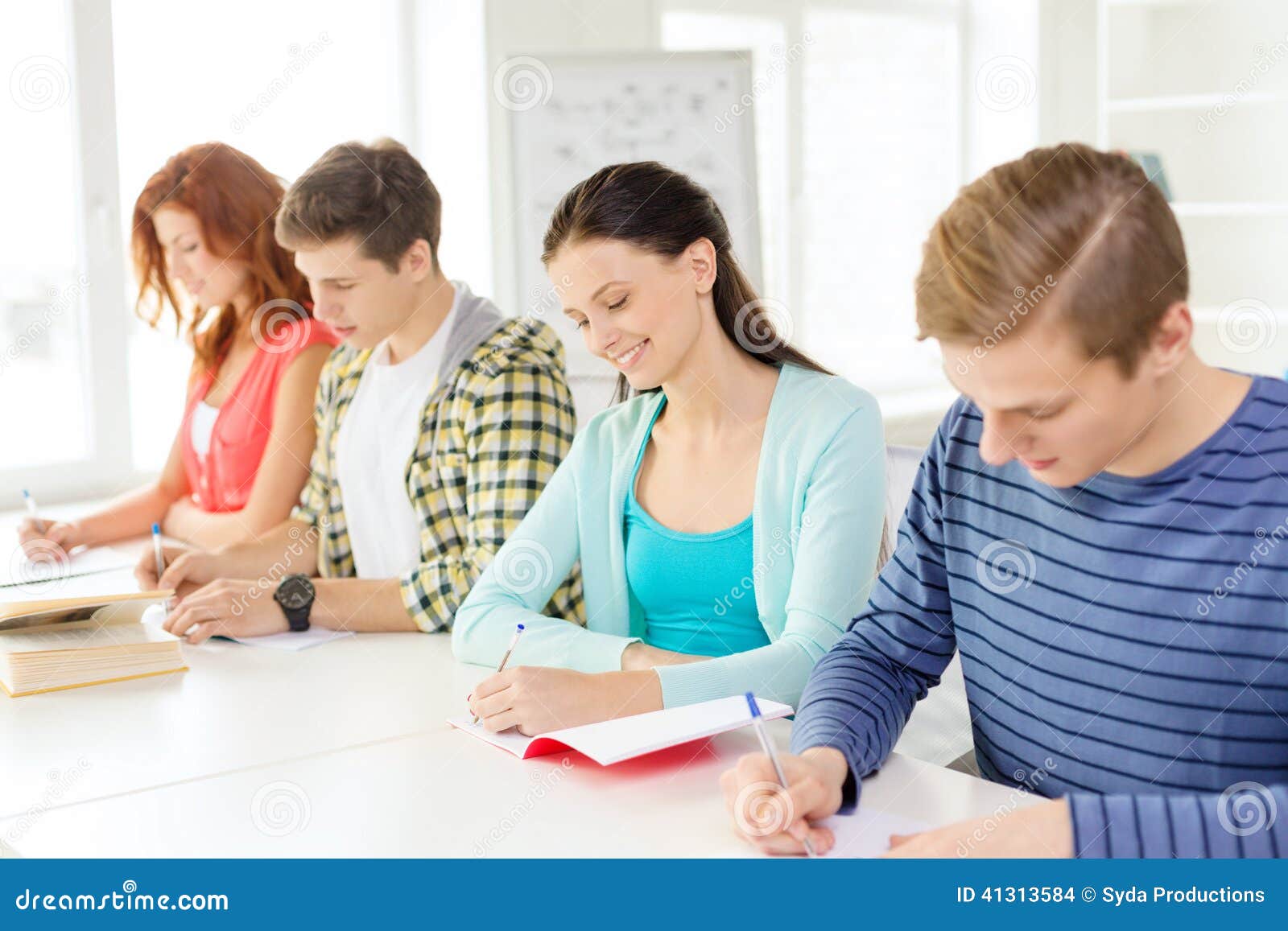 Students with Textbooks and Books at School Stock Photo - Image of ...
