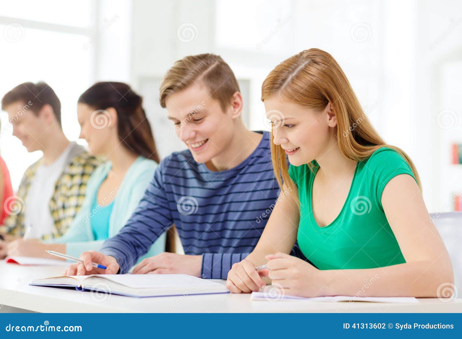 Students with Textbooks and Books at School Stock Photo - Image of ...