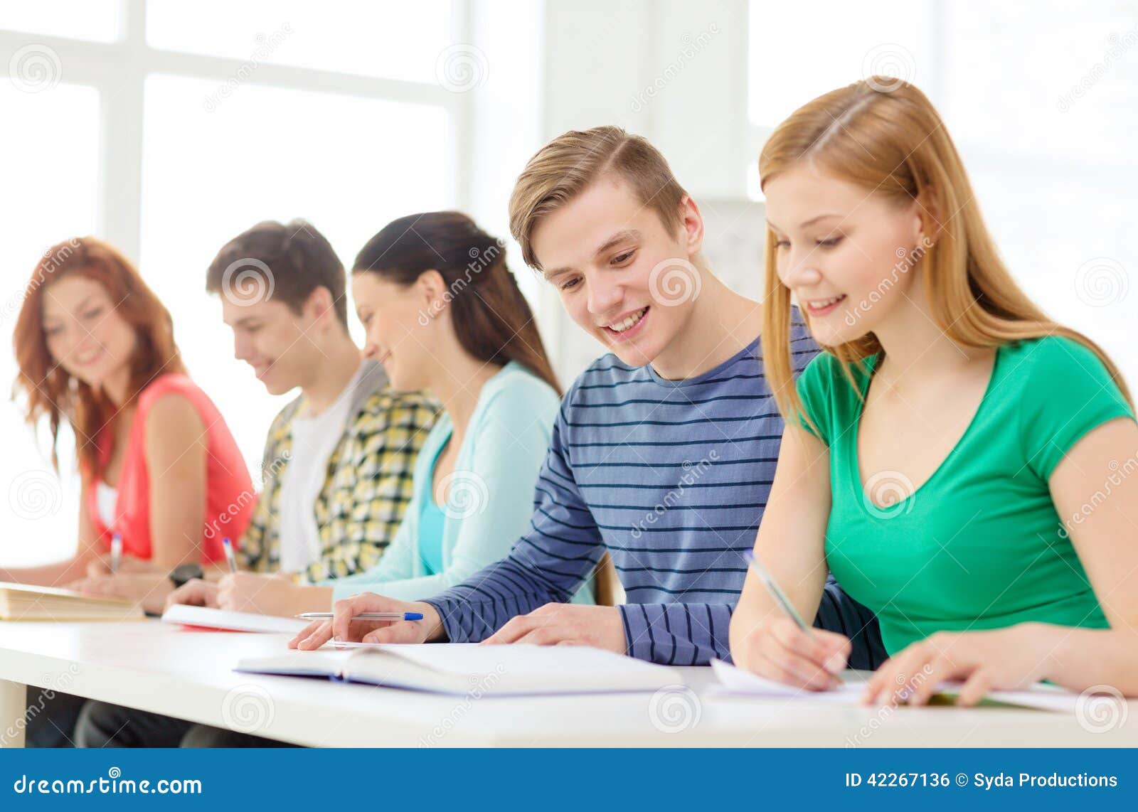 Students with Textbooks and Books at School Stock Photo - Image of ...