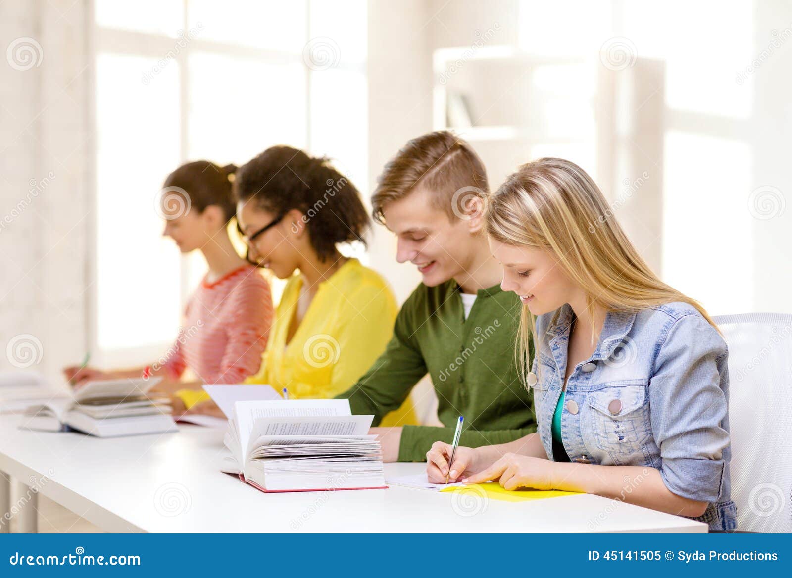 Students with Textbooks and Books at School Stock Image - Image of ...